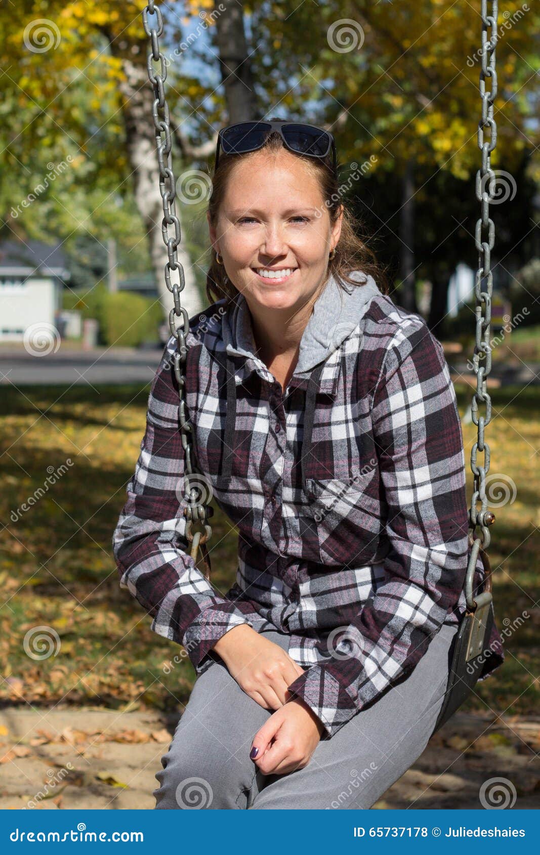 Young Women on a Swing at Fall Stock Photo - Image of autumn, park ...