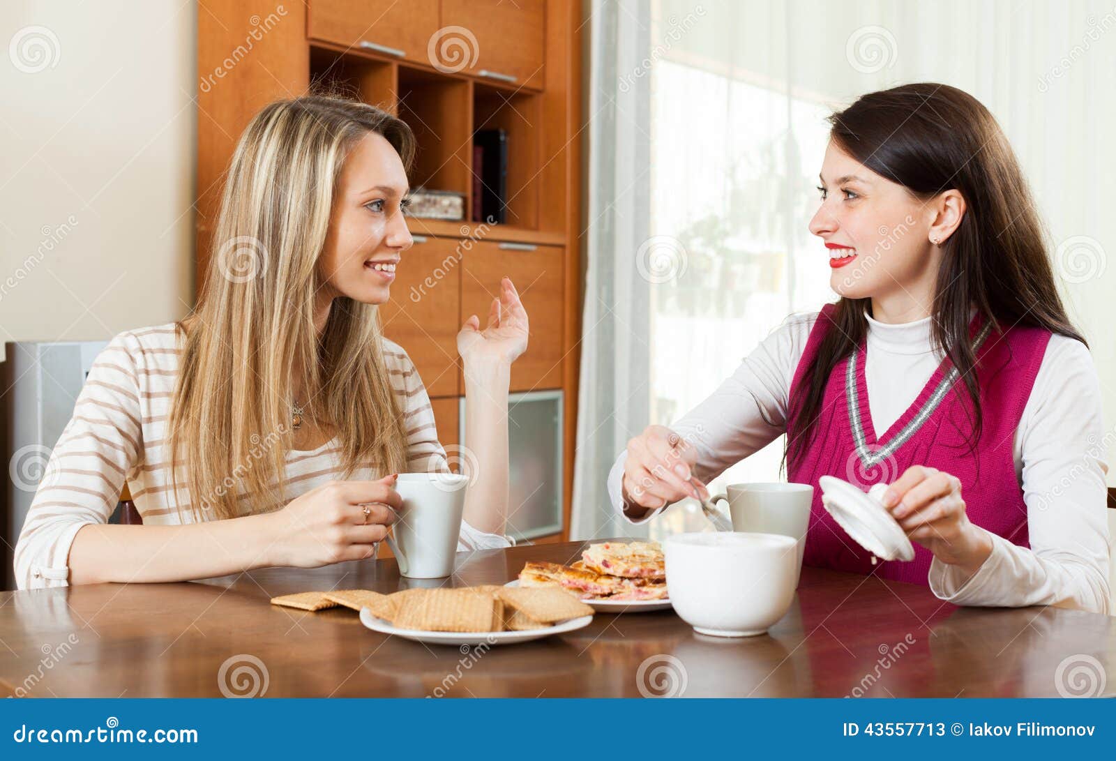 Young Women Table Gossiping and Drinking Tea Stock Image - Image of ...