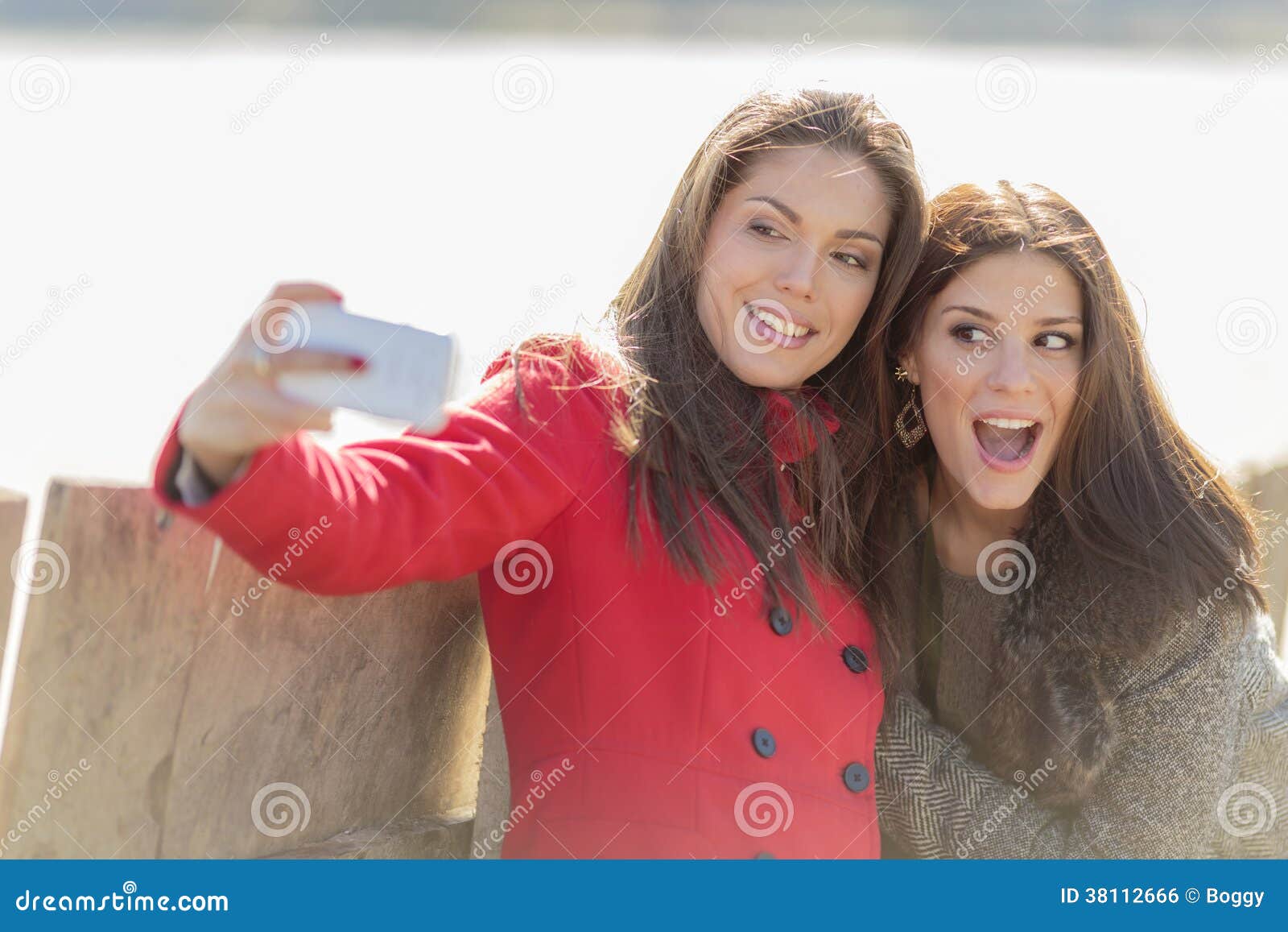 Young Women Taking Photo with Mobile Phone Stock Photo - Image of ...