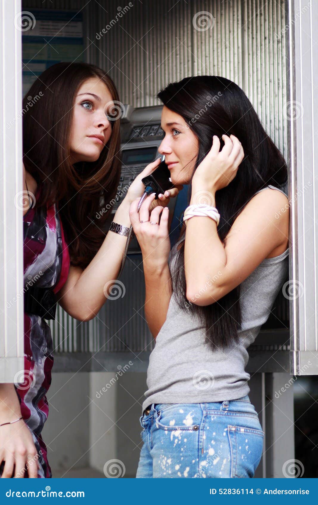 Young Women Talking on Payphone Stock Photo - Image of payphone, talk ...