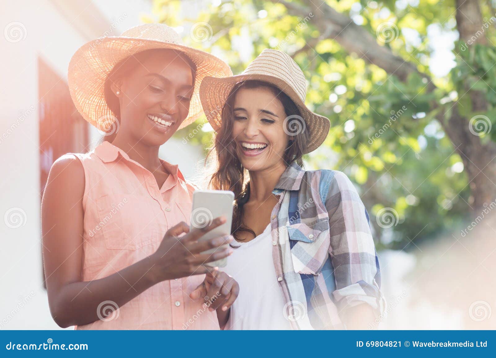 Young Women Using Mobile Phone Stock Image - Image of communication ...