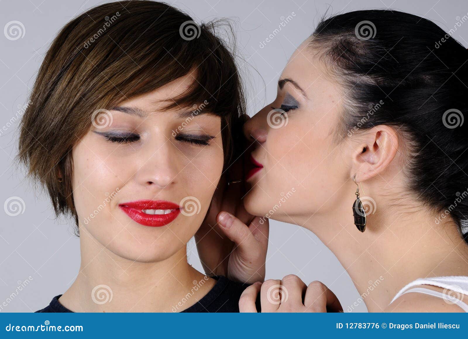 Young women whispering stock photo. Image of lovely, smiling - 12783776