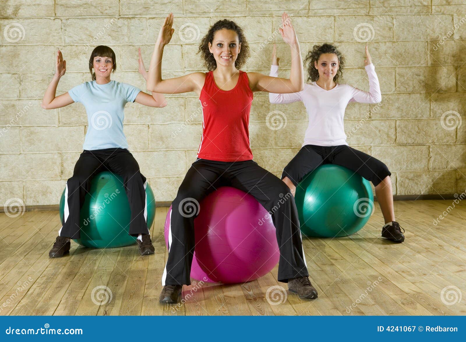 Young Women Working Out Siting on Big Balls Stock Image - Image of ...