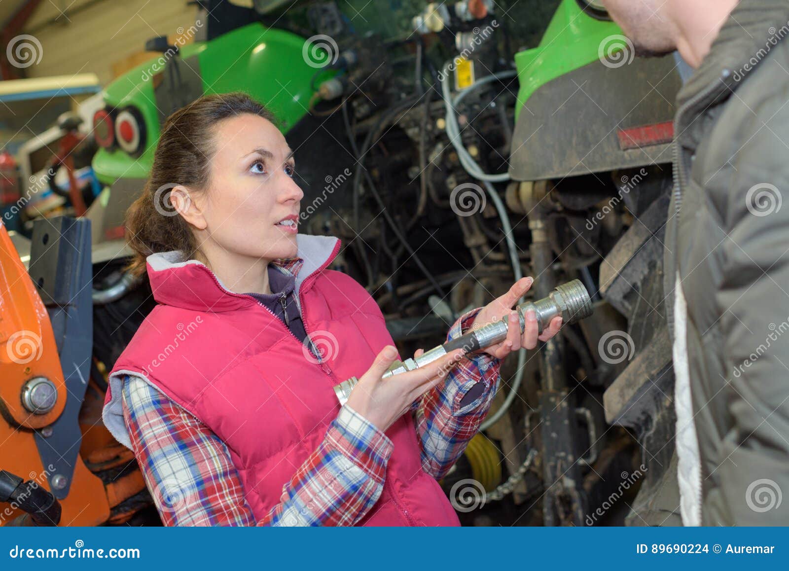 Young Worker Checks Pressure Tractor Engine Stock Photo - Image of ...