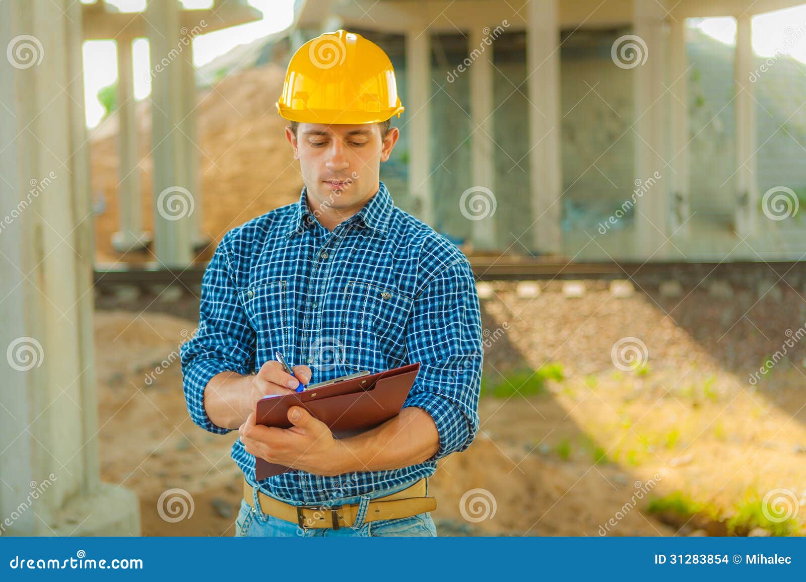 A Young Worker with Clipboard Stock Photo - Image of clipboard, control ...