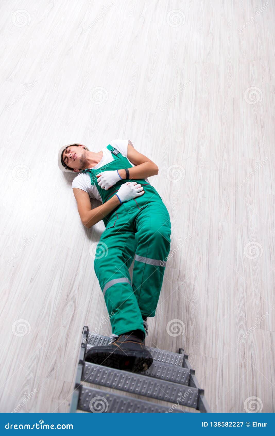The Young Worker Falling from the Ladder Stock Image - Image of ...