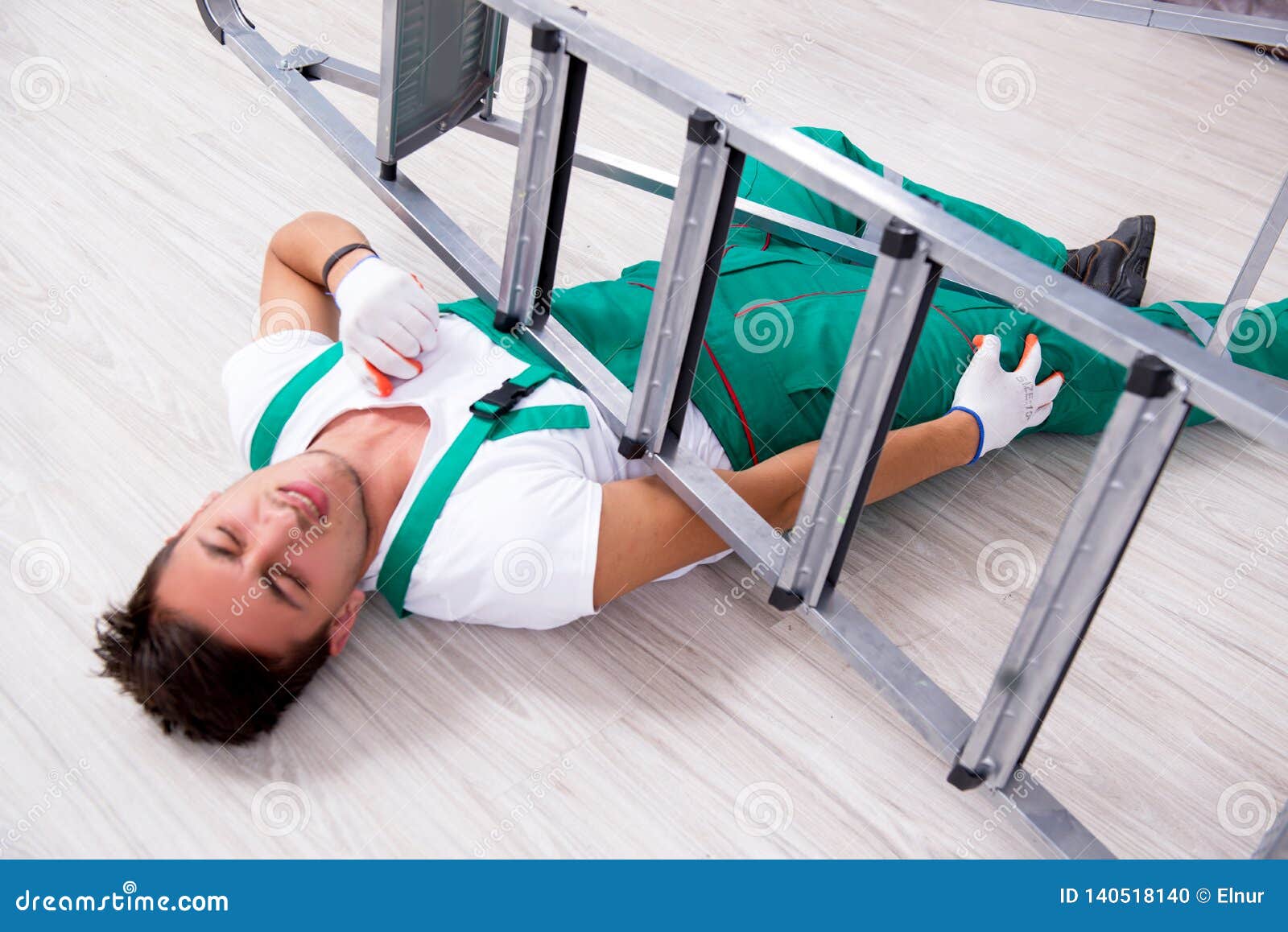 The Young Worker Falling from the Ladder Stock Photo - Image of ...