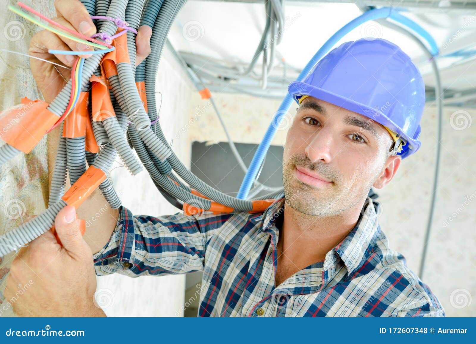 Young Worker Gathering Cables Stock Photo - Image of electrician ...