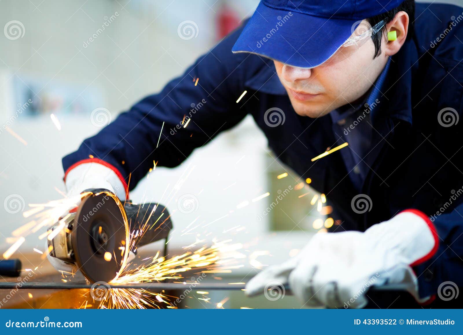 Young Worker Grinding a Metal Plate Stock Photo - Image of safety ...
