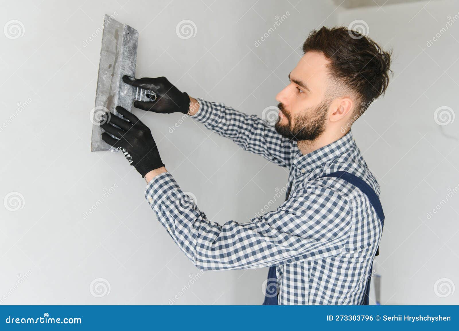 Young Worker Making Repair in Room Stock Photo - Image of finishing ...