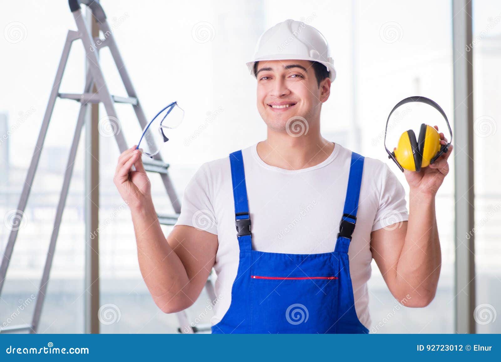 The Young Worker with Noise Cancelling Headphones Stock Photo - Image ...