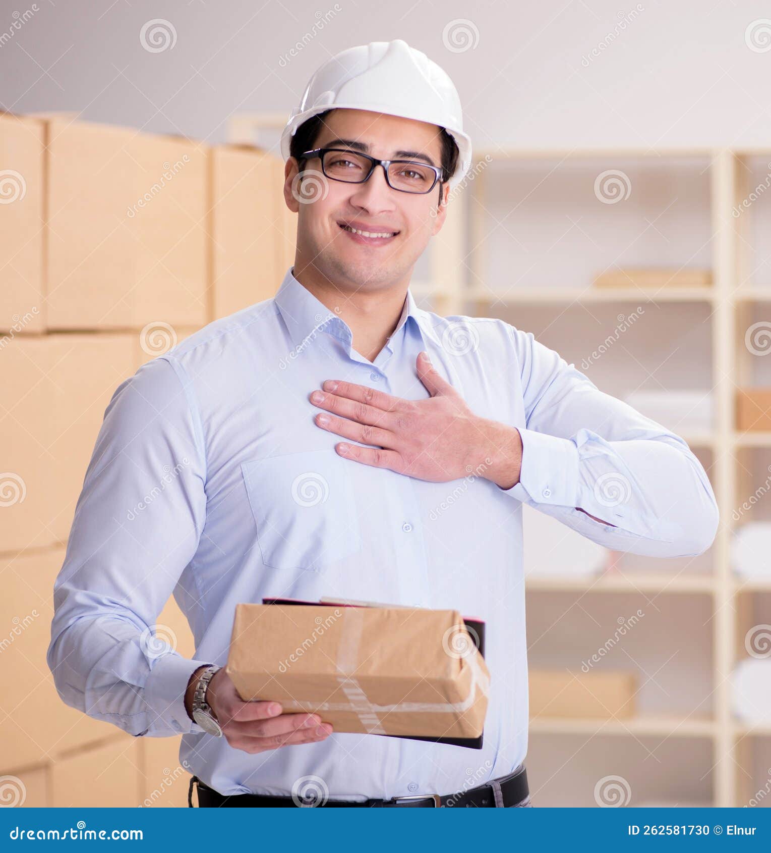 Young Worker in the Postal Office Dealing with Parcels Stock Photo ...