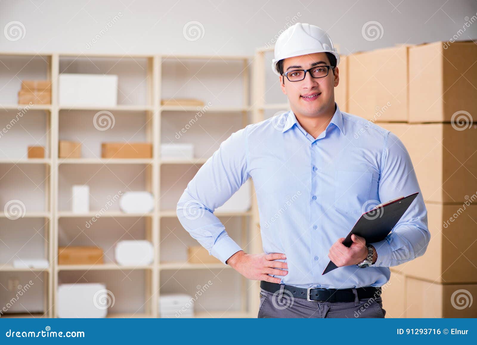 The Young Worker in the Postal Office Dealing with Parcels Stock Photo ...
