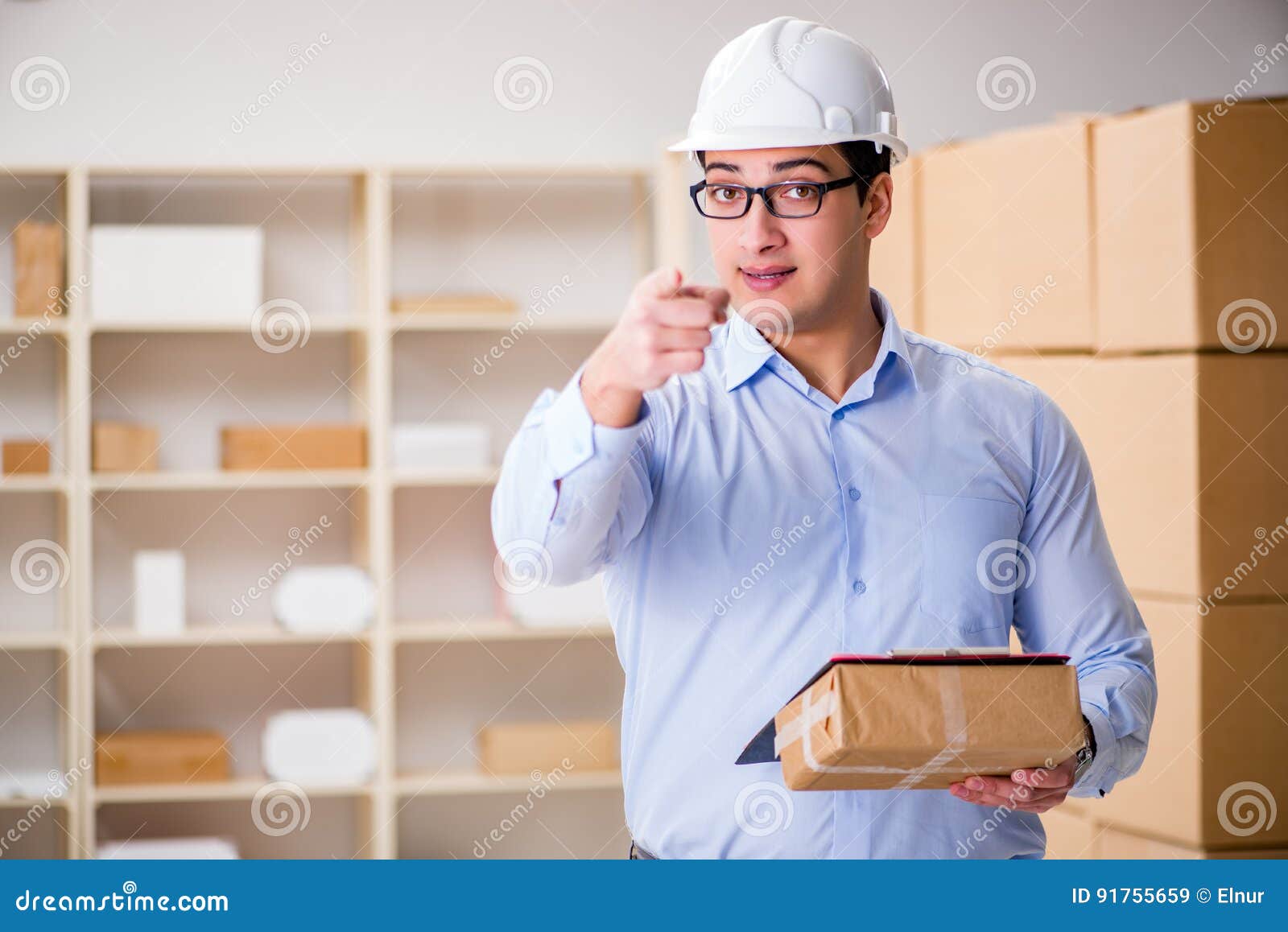 The Young Worker in the Postal Office Dealing with Parcels Stock Image ...