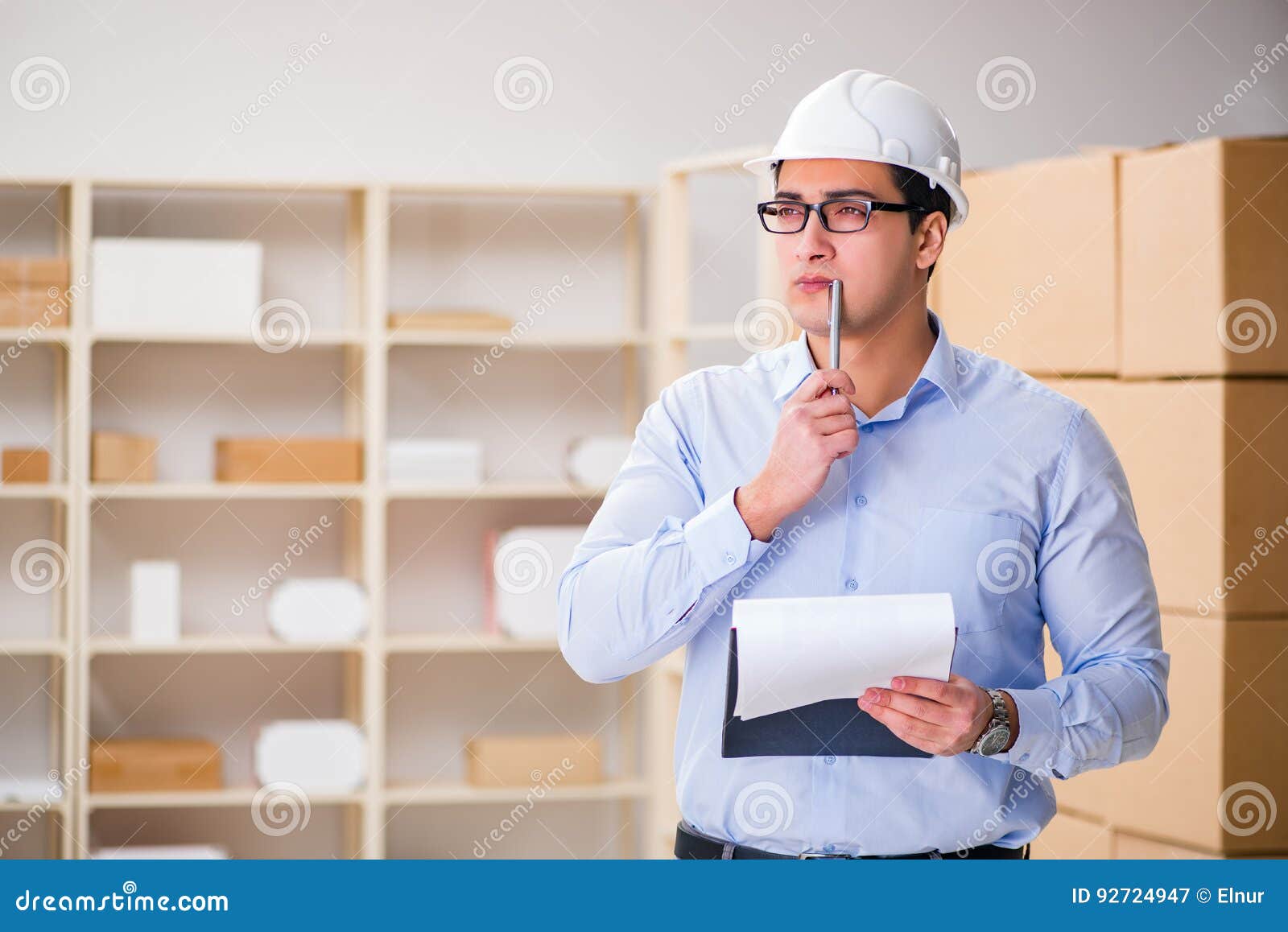 The Young Worker in the Postal Office Dealing with Parcels Stock Image ...