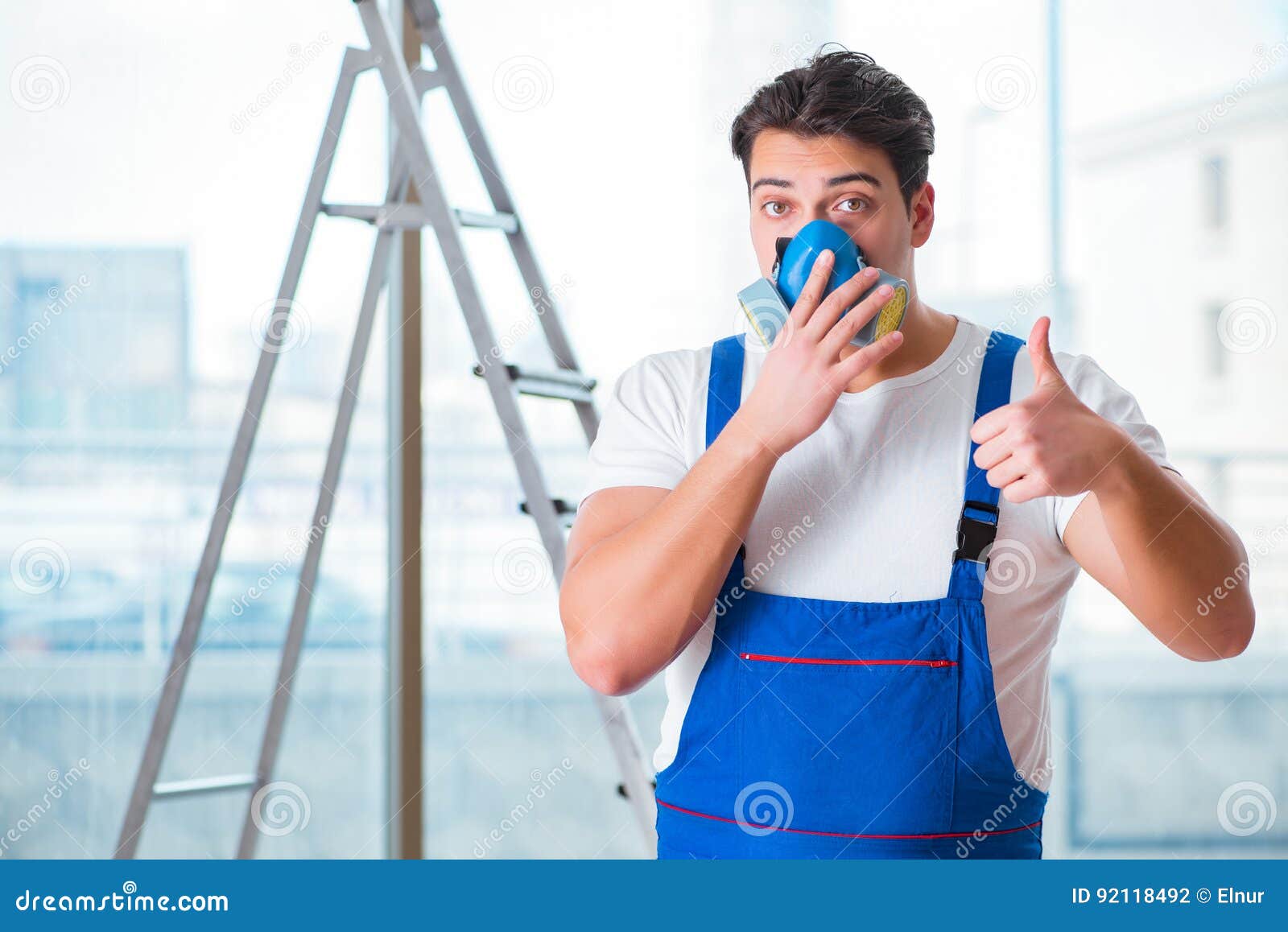 The Young Worker with Protective Face Gas Mask Stock Photo - Image of ...