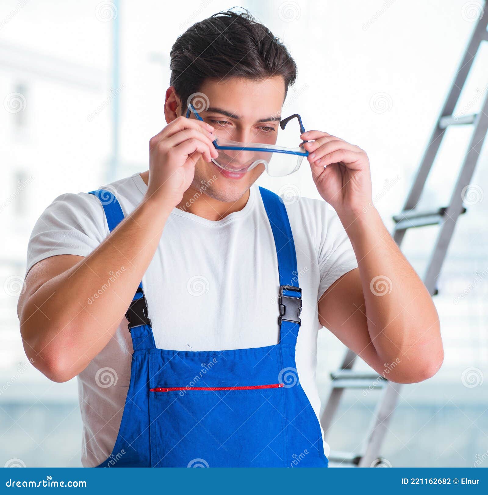 Young Worker with Safety Goggles Stock Photo - Image of handyman ...