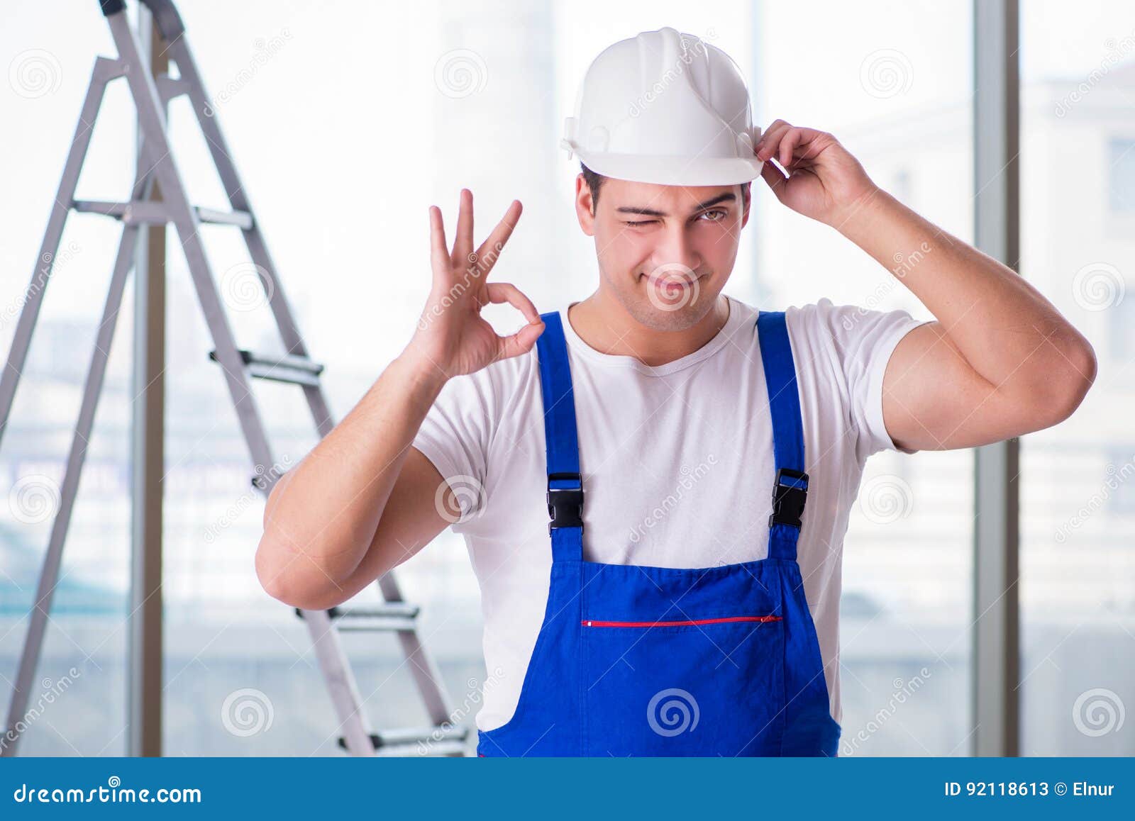 The Young Worker with Safety Helmet Hardhat Stock Image - Image of ...