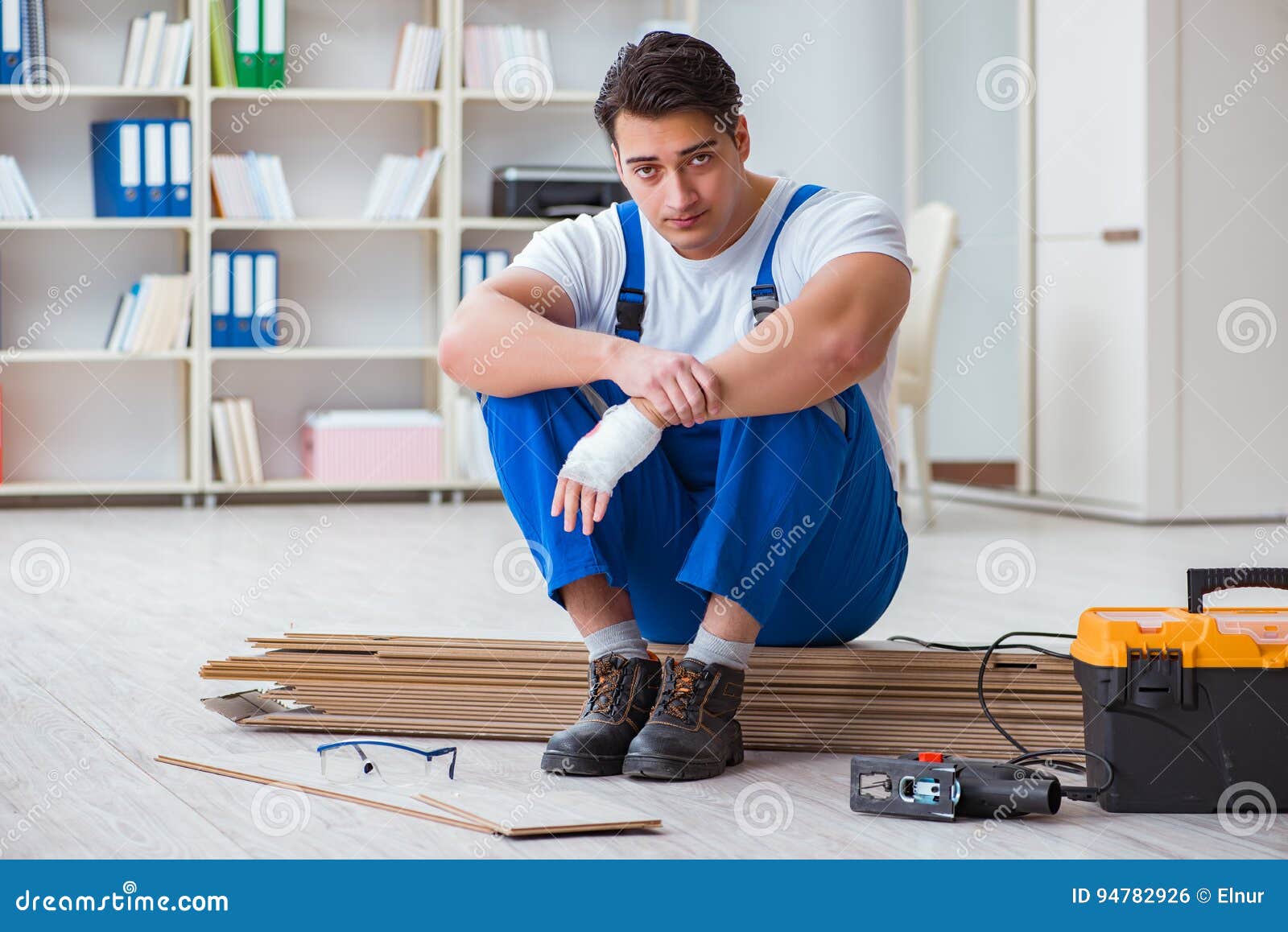 The Young Worker Working on Floor Laminate Tiles Stock Photo - Image of ...