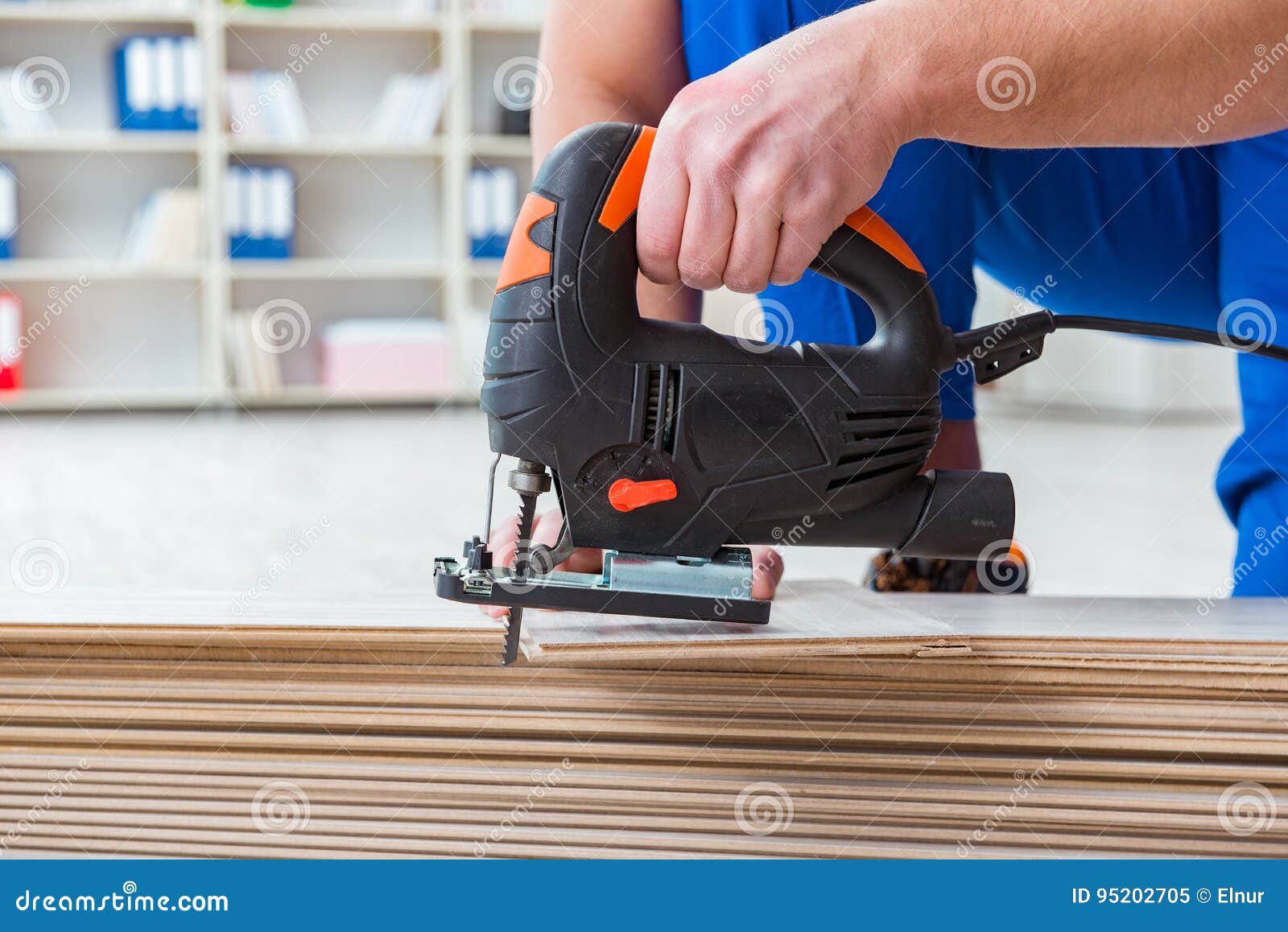 The Young Worker Working on Floor Laminate Tiles Stock Image - Image of ...