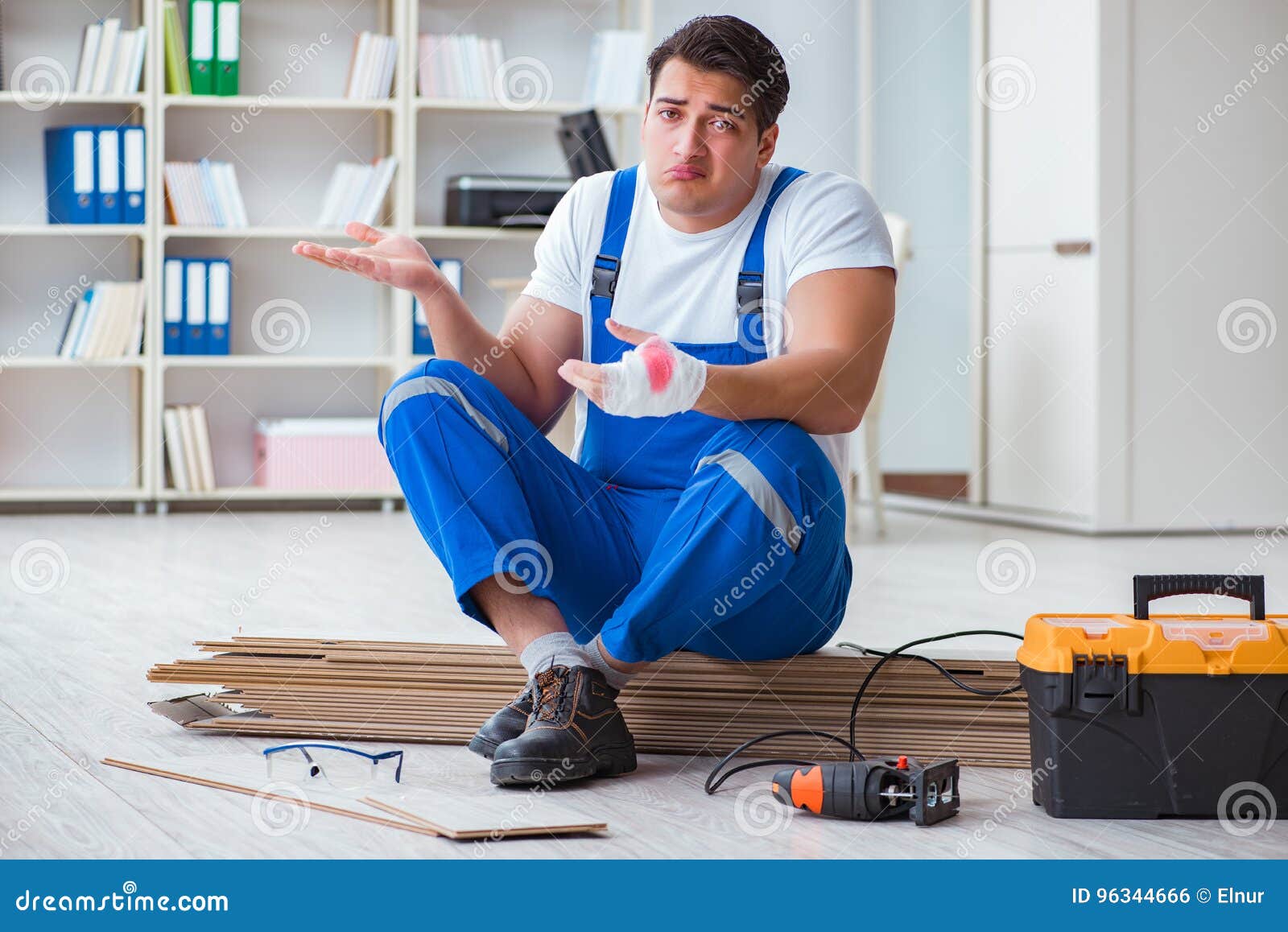 The Young Worker Working on Floor Laminate Tiles Stock Photo - Image of ...