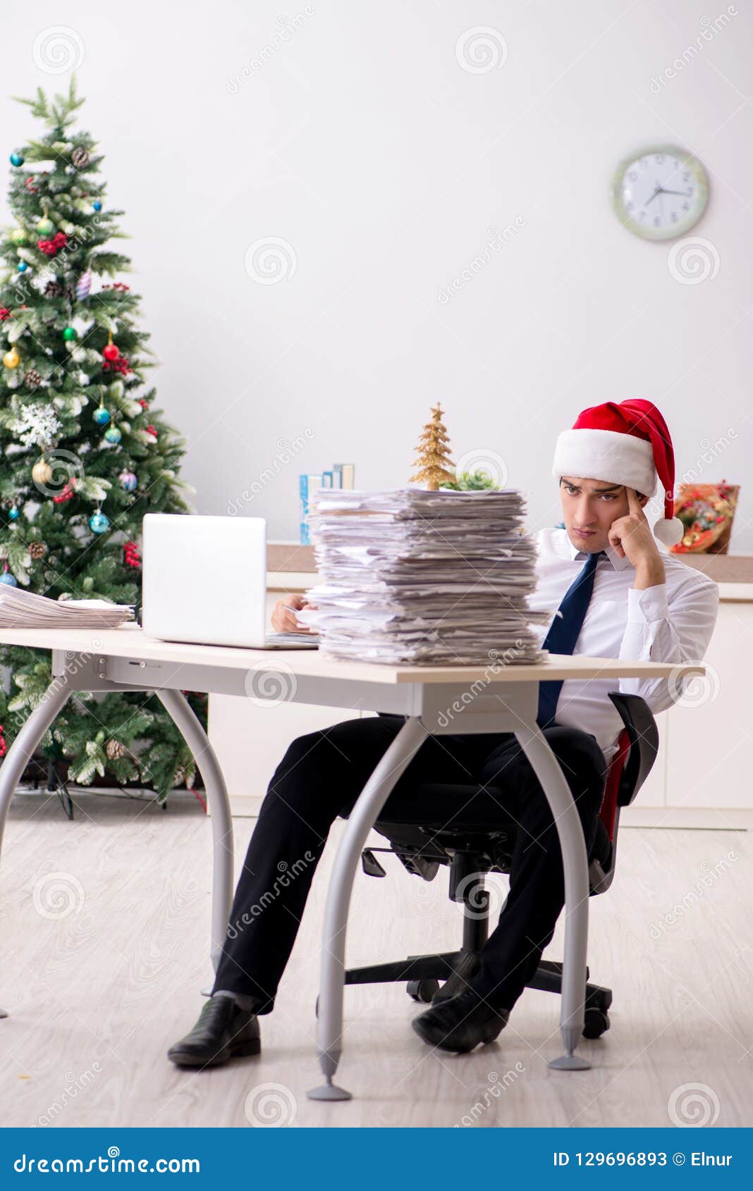 The Young Worker Working in Office on Christmas Shift Stock Image ...