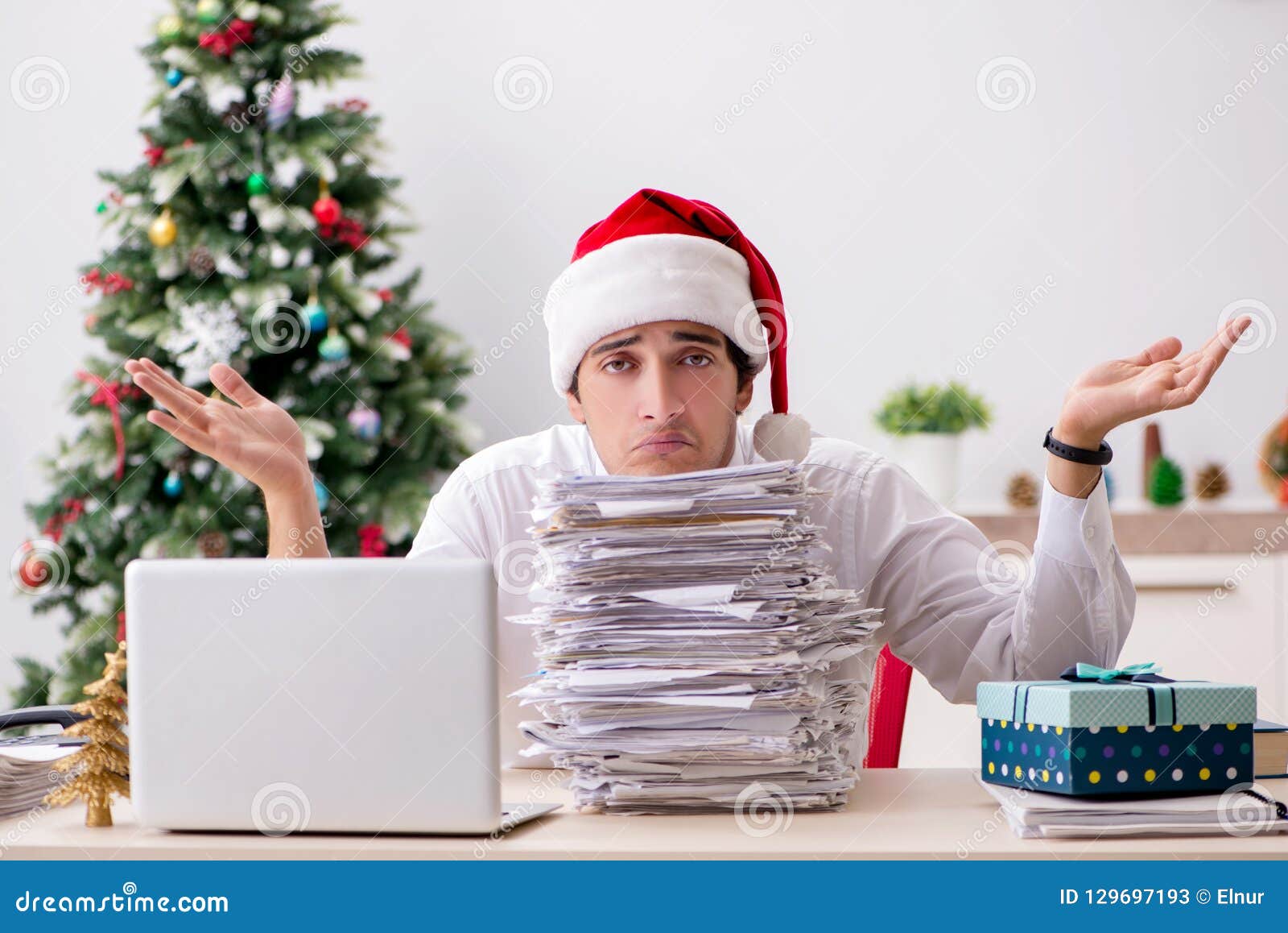 The Young Worker Working in Office on Christmas Shift Stock Image ...