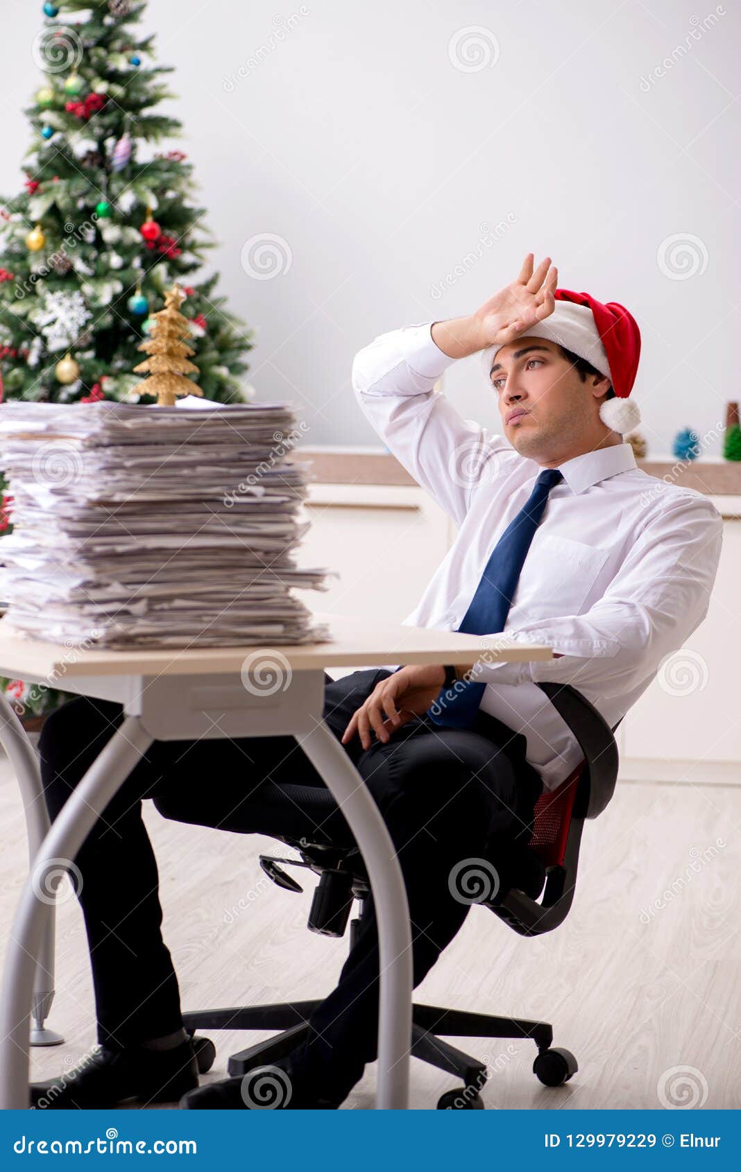 The Young Worker Working in Office on Christmas Shift Stock Image ...