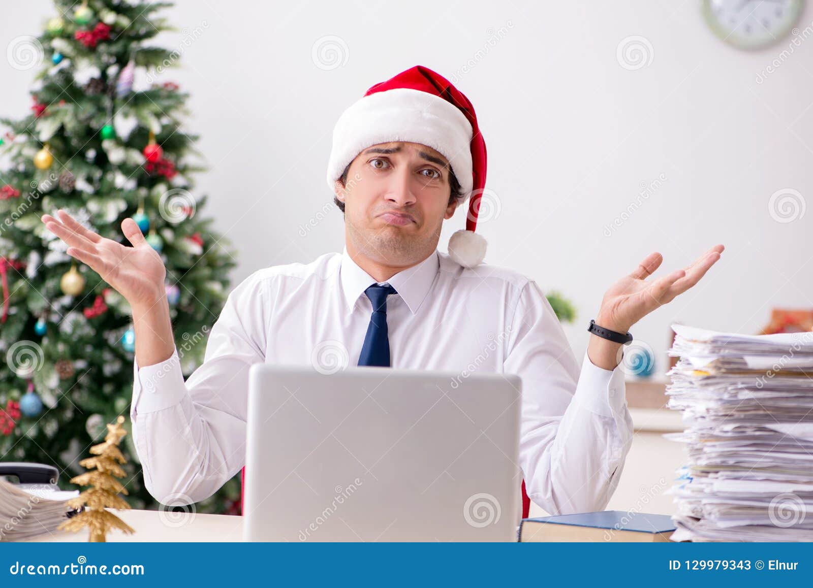 The Young Worker Working in Office on Christmas Shift Stock Image ...