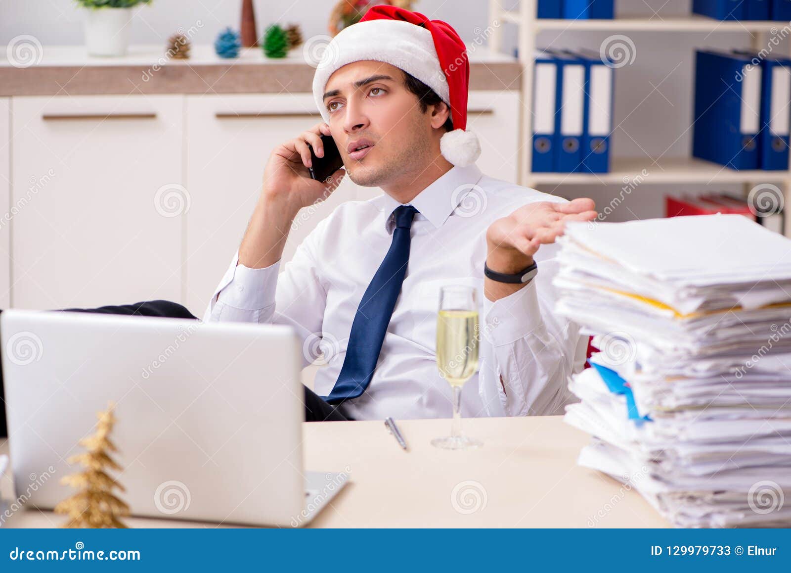 The Young Worker Working in Office on Christmas Shift Stock Image ...