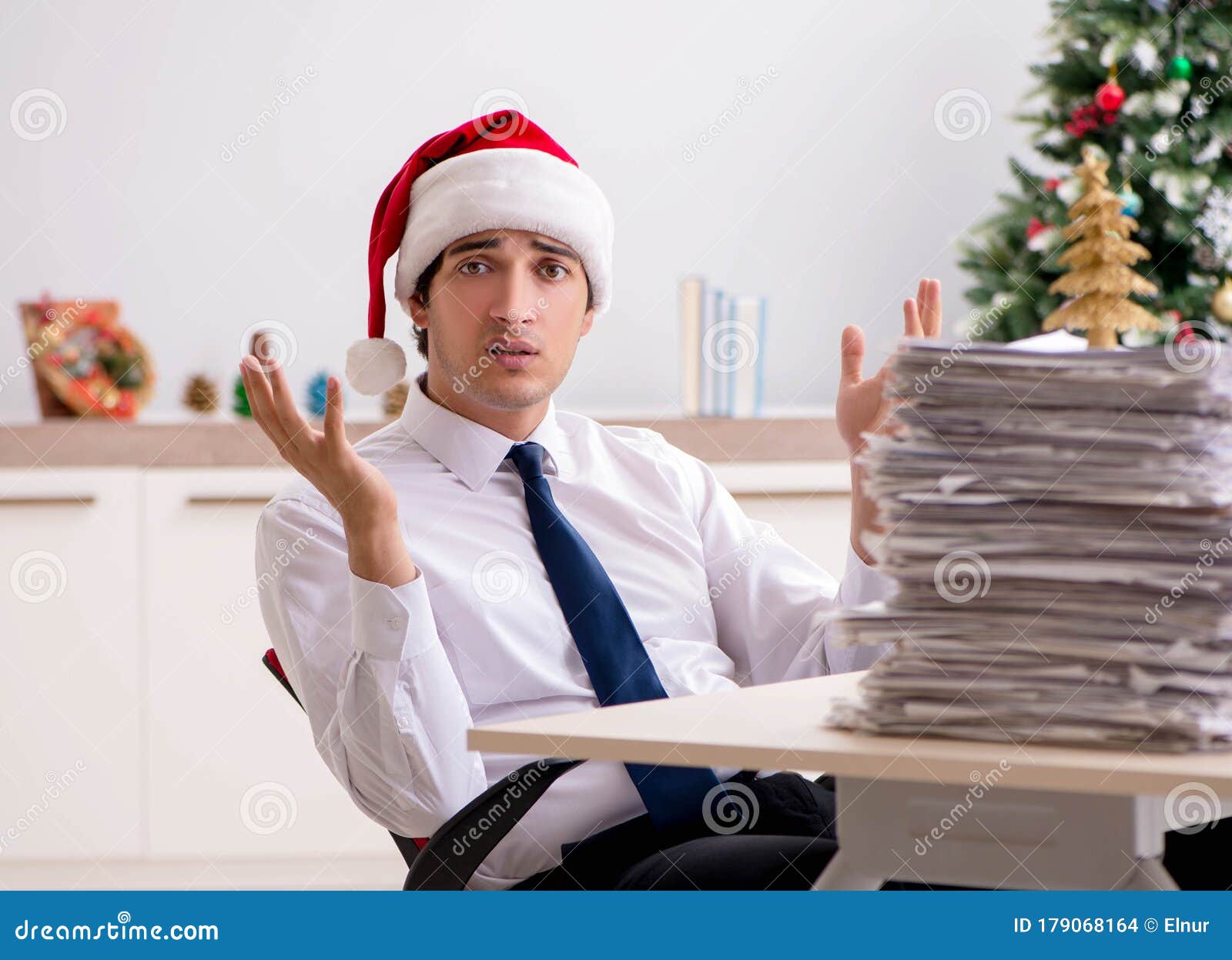 Young Worker Working in Office on Christmas Shift Stock Photo - Image ...