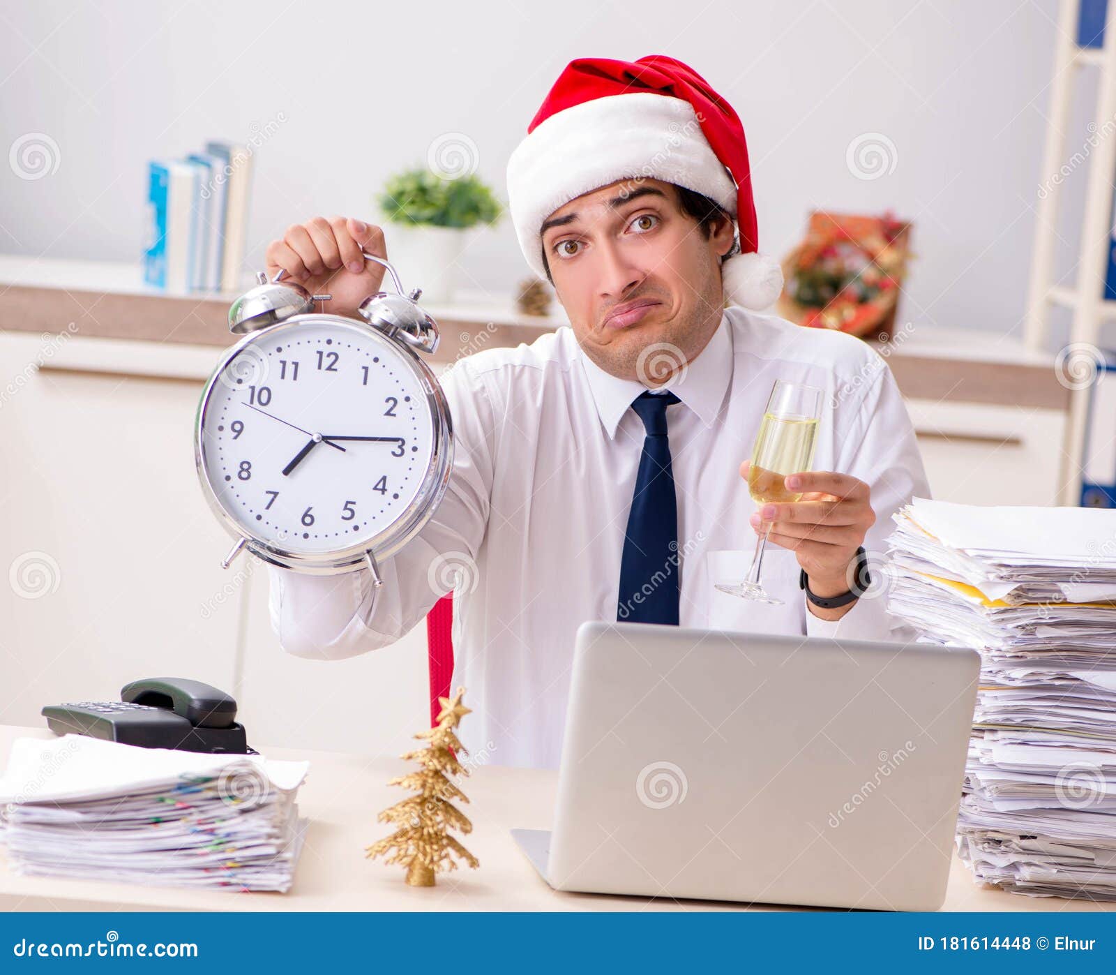 Young Worker Working in Office on Christmas Shift Stock Photo - Image ...