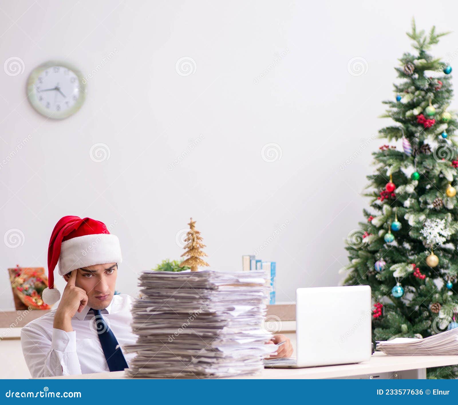 Young Worker Working in Office on Christmas Shift Stock Photo - Image ...