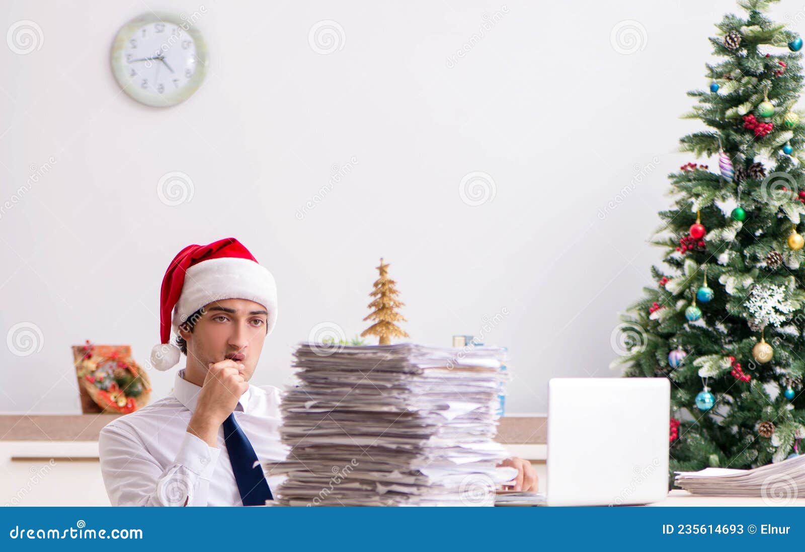 Young Worker Working in Office on Christmas Shift Stock Image - Image ...