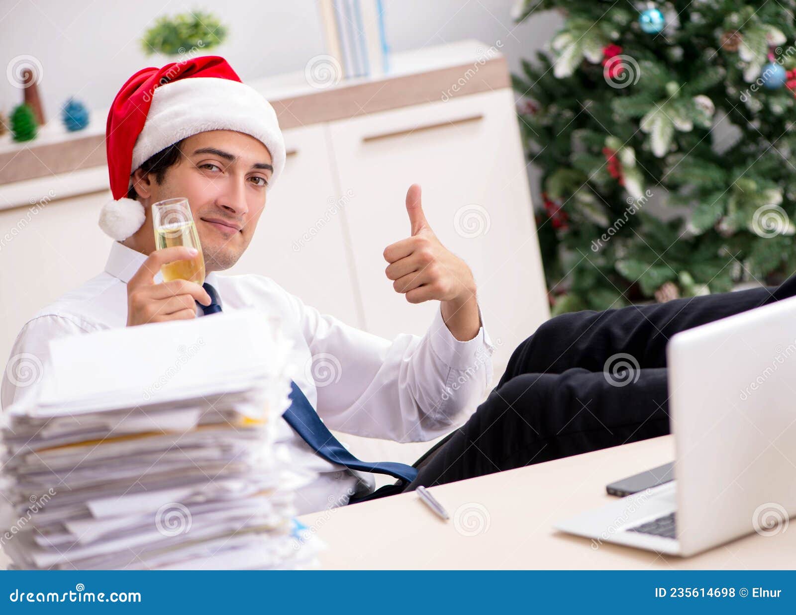 Young Worker Working in Office on Christmas Shift Stock Photo - Image ...