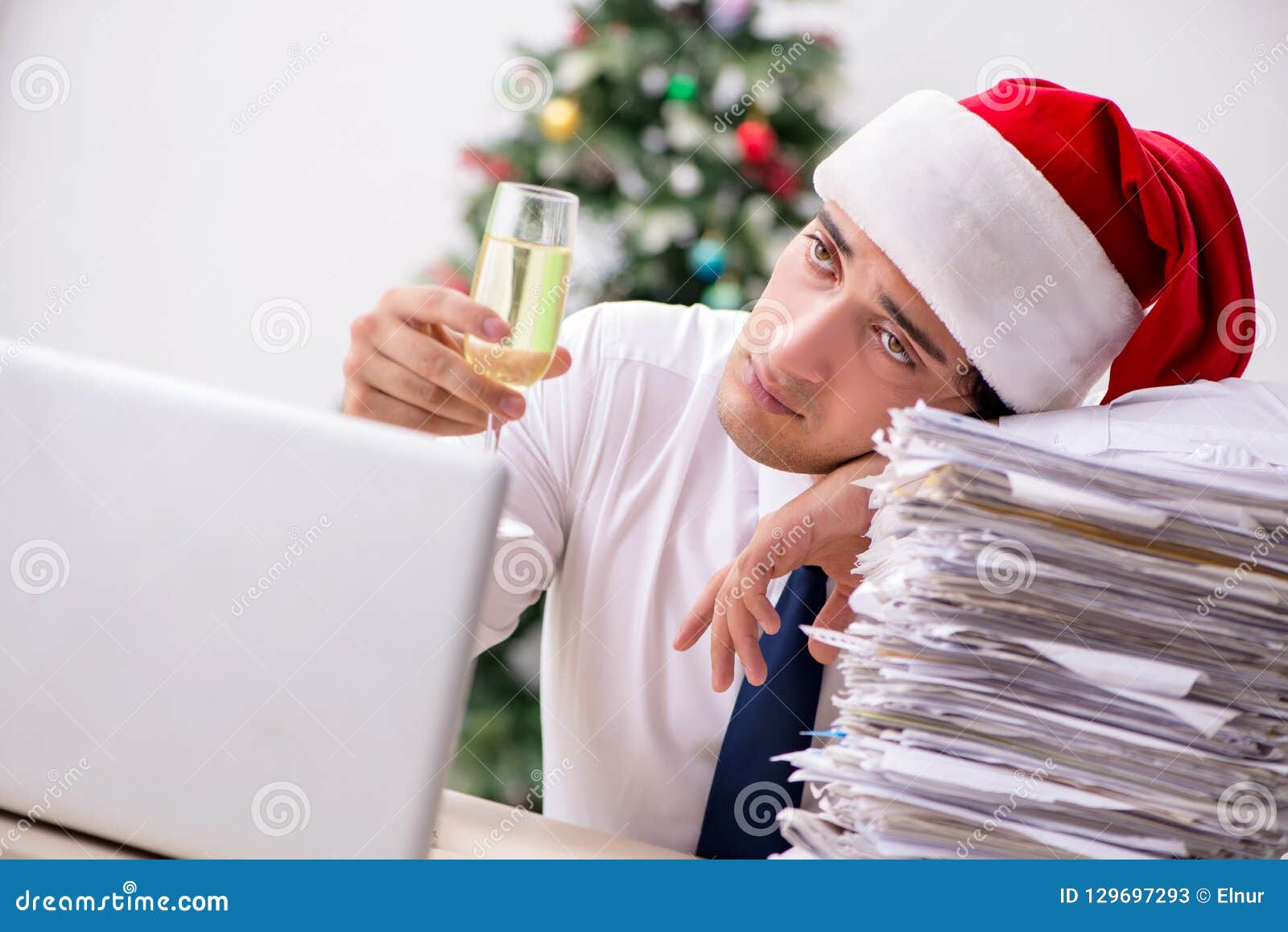 The Young Worker Working in Office on Christmas Shift Stock Image ...