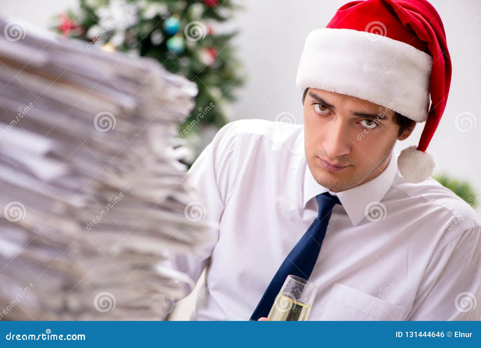 The Young Worker Working in Office on Christmas Shift Stock Photo ...