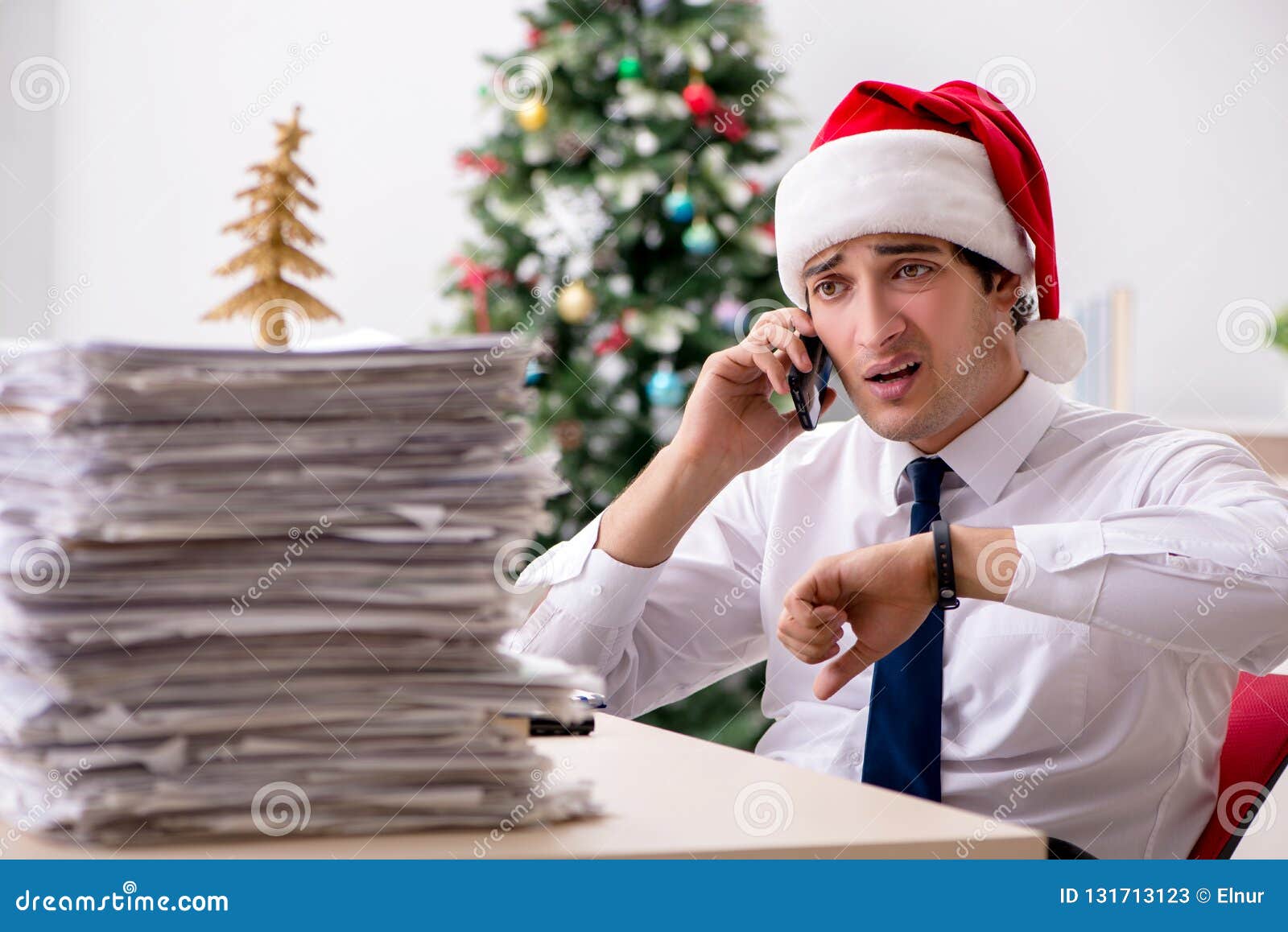 The Young Worker Working in Office on Christmas Shift Stock Image ...