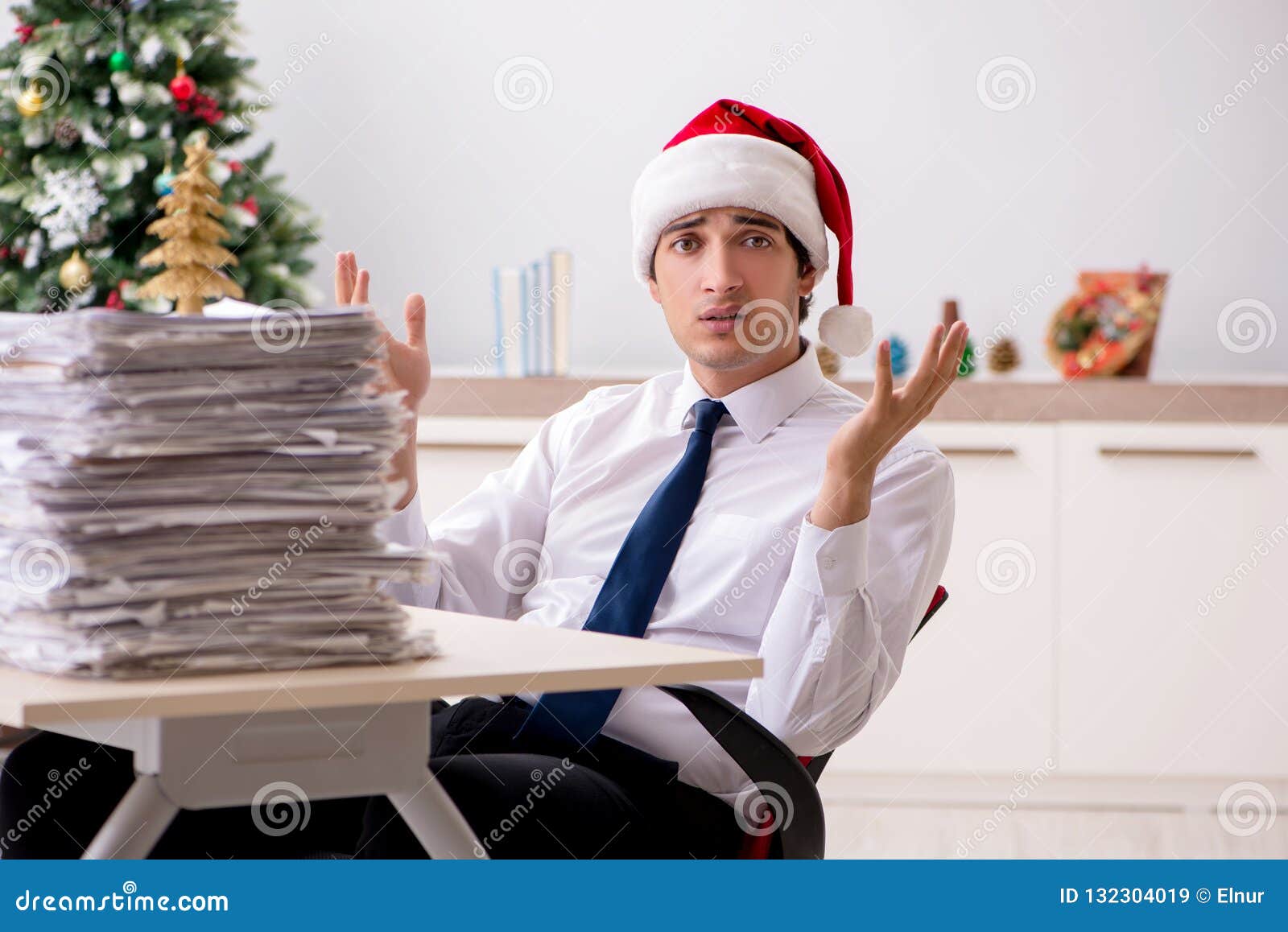 The Young Worker Working in Office on Christmas Shift Stock Image ...