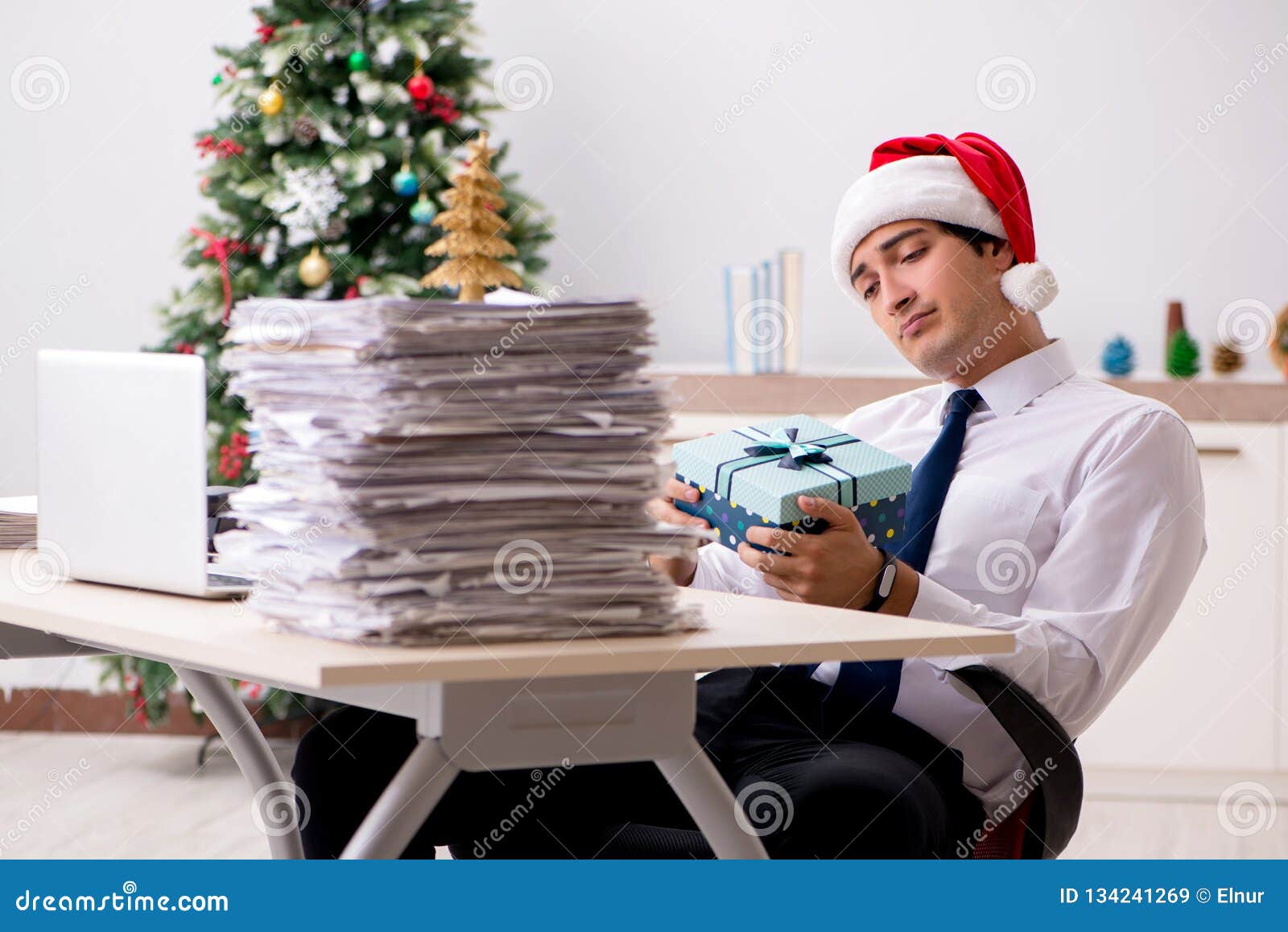 The Young Worker Working in Office on Christmas Shift Stock Image ...
