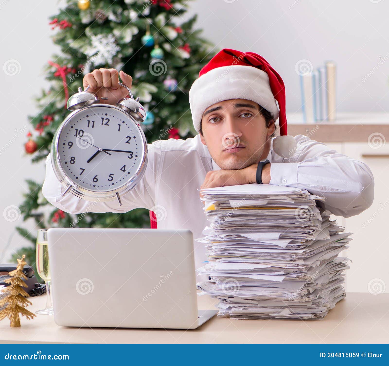 Young Worker Working in Office on Christmas Shift Stock Image - Image ...
