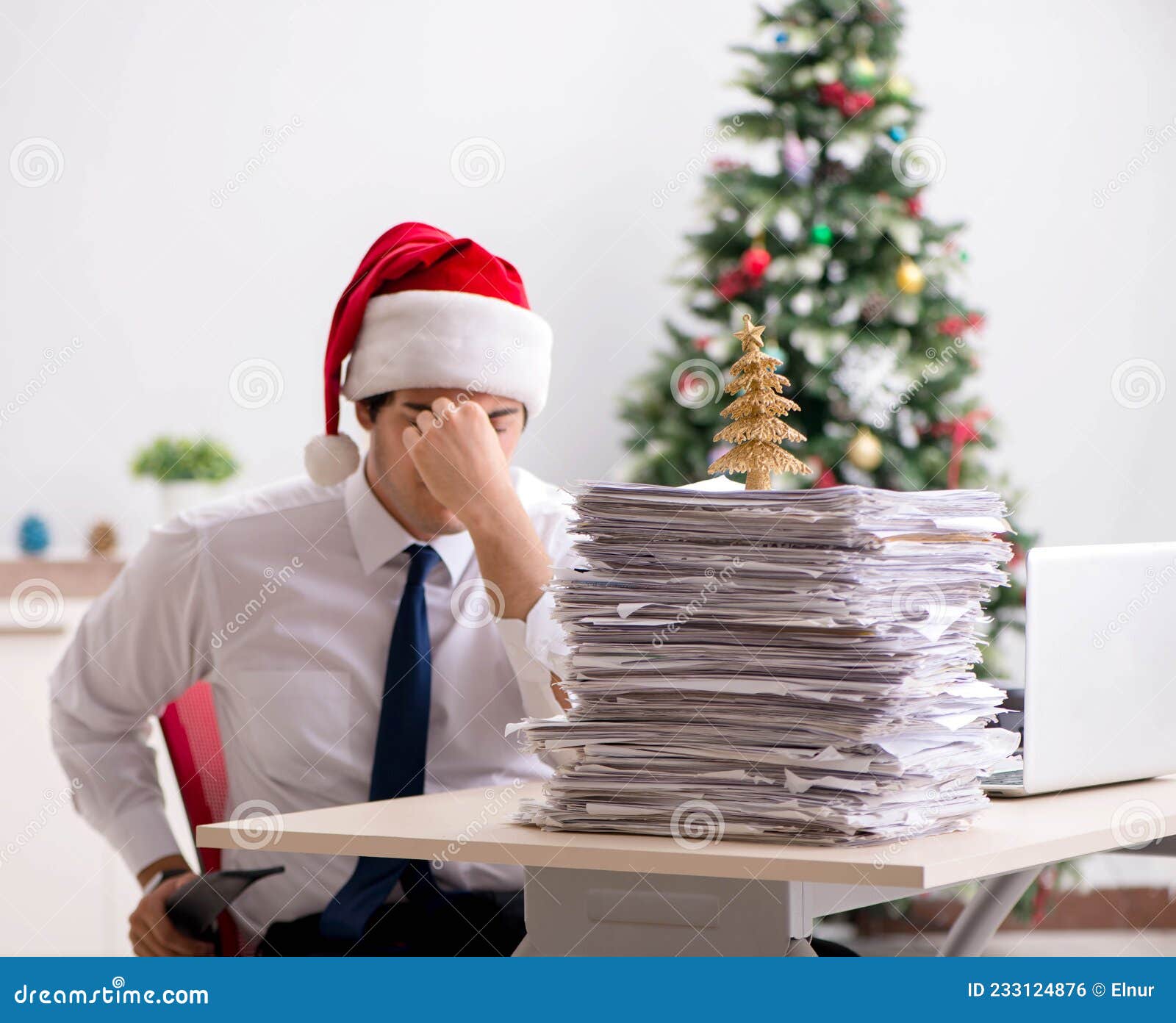 Young Worker Working in Office on Christmas Shift Stock Photo - Image ...