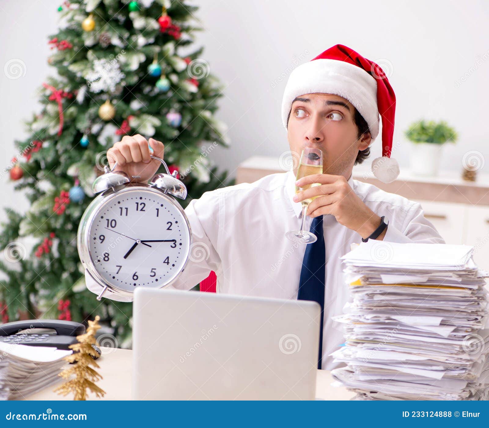 Young Worker Working in Office on Christmas Shift Stock Photo - Image ...