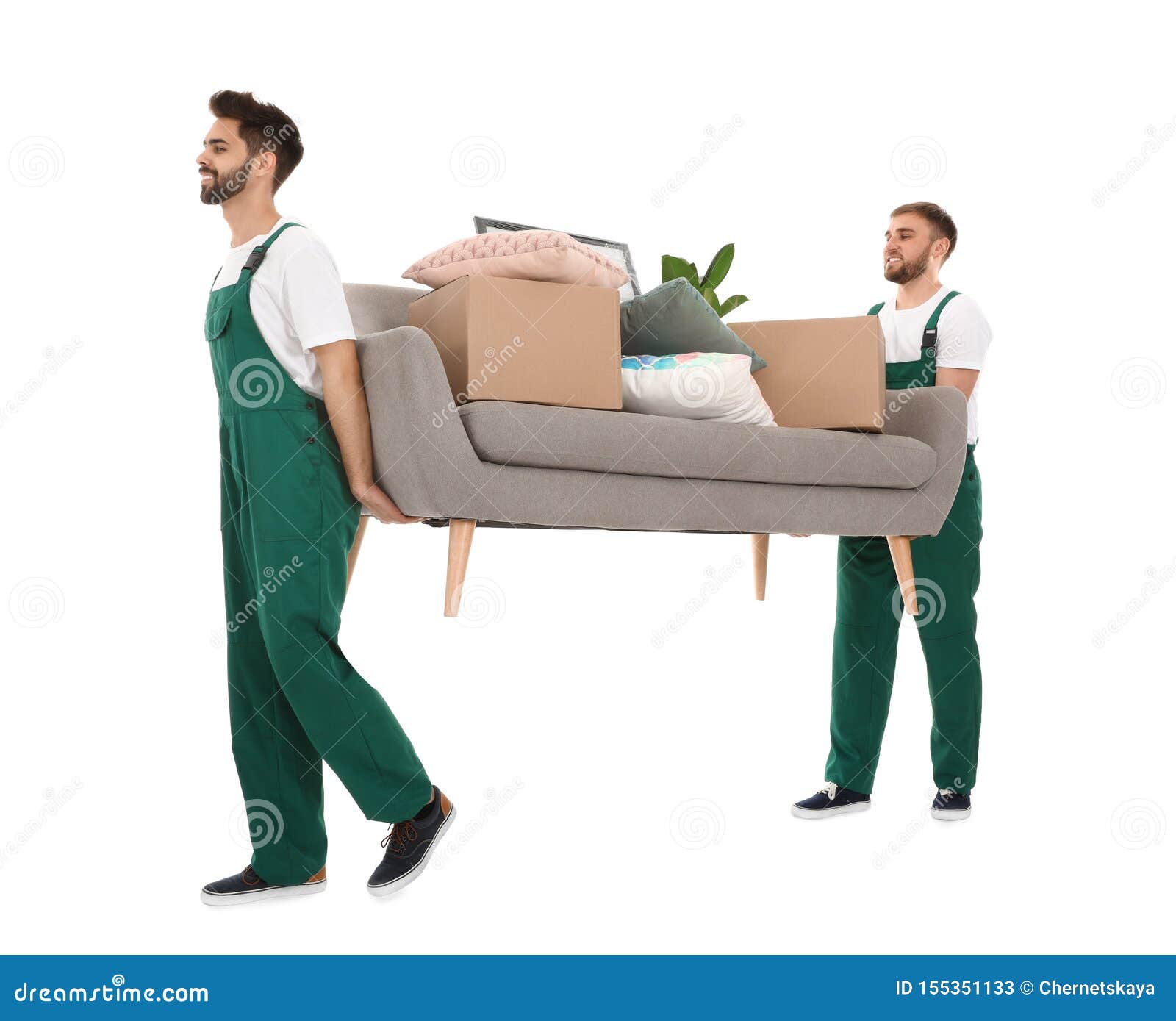 Young Workers Carrying Sofa with Stuff on White. Moving Service Stock ...