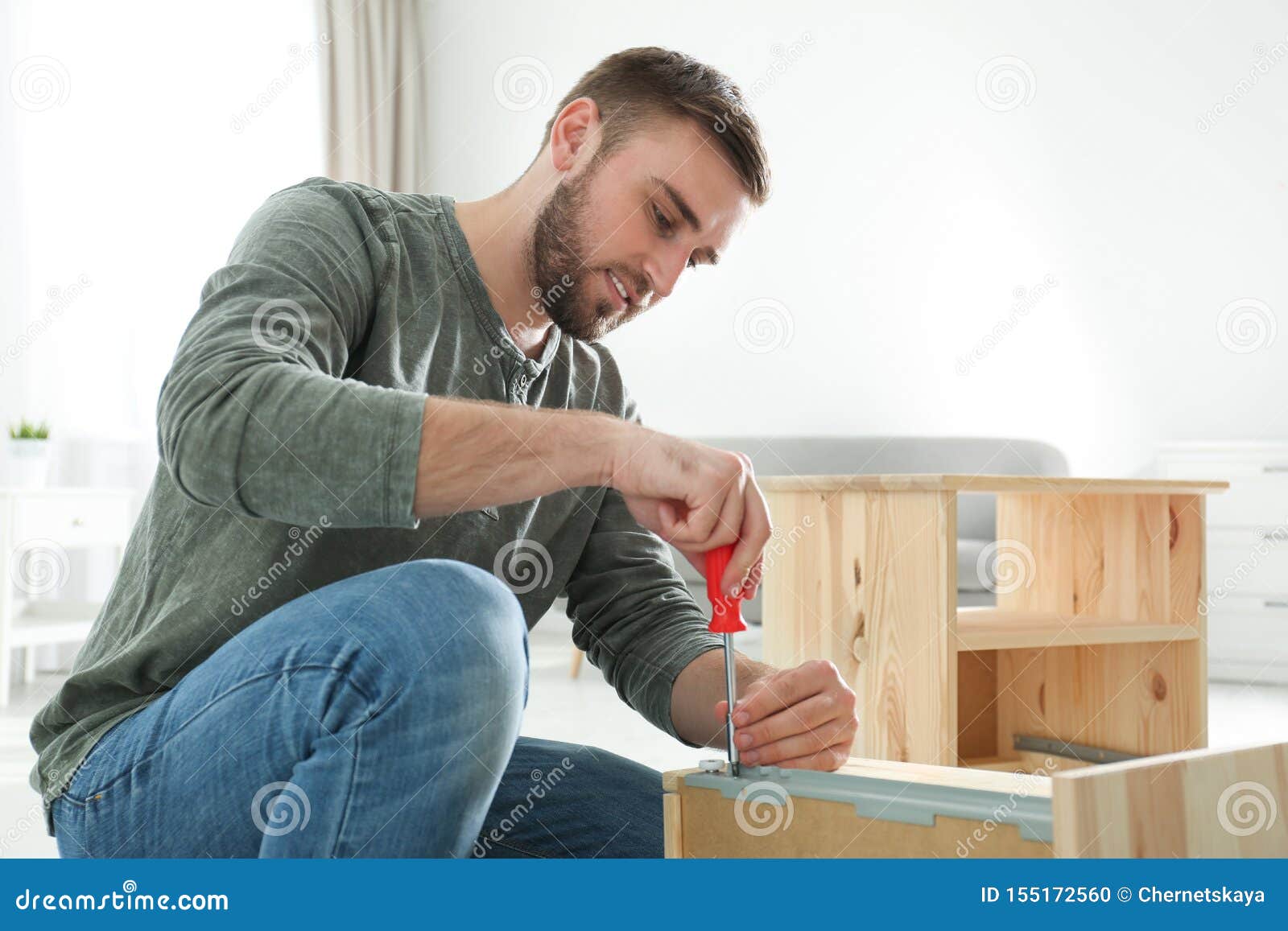 Young Working Man Repairing Drawer Stock Photo - Image of handsome ...