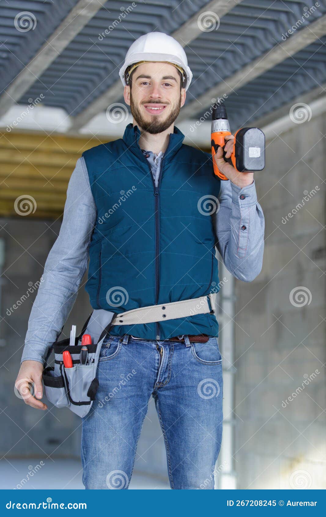 Young Workman Wearing Toolbelt and Holding Drill Stock Image - Image of ...