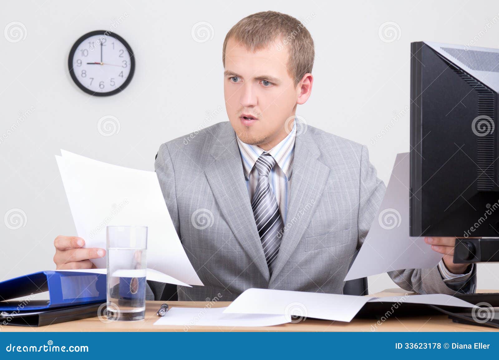 Young Worried Accountant Doing Paperwork in Office Stock Photo - Image ...