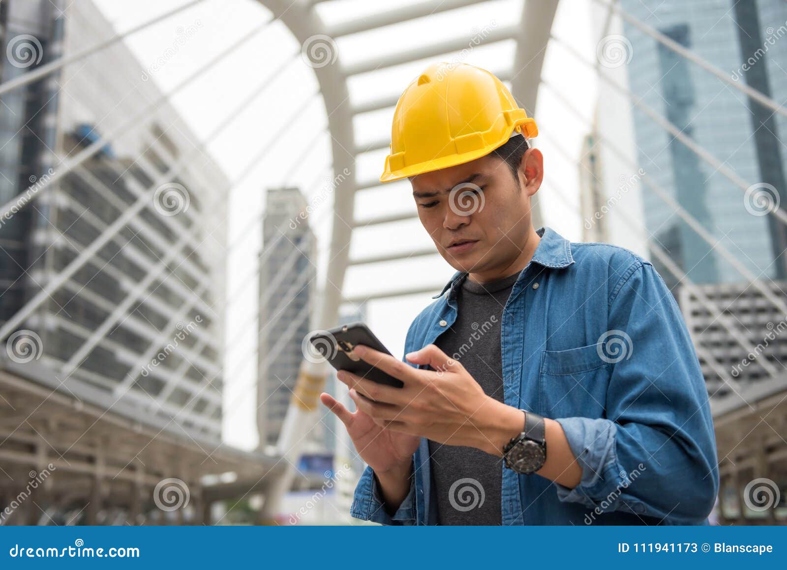 Young Foreman Engineer Worker Using Smartphone Stock Image - Image of ...