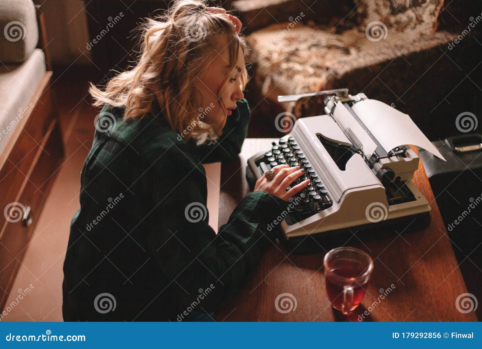 Young Writer Using Typewriter at Home Stock Photo - Image of paper ...