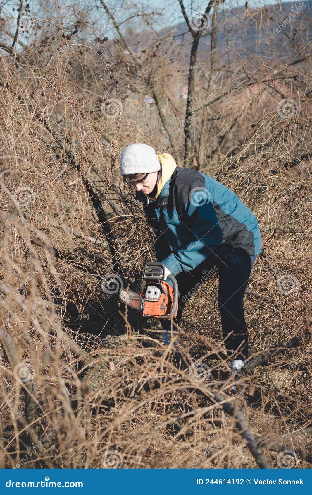 Young 17-year-old Temporary Worker in Work Clothes Wrestles with a ...